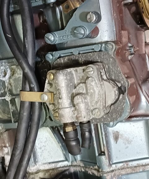 What is the purpose of this fuel pump “deflector” ? | Antique Outboard ...